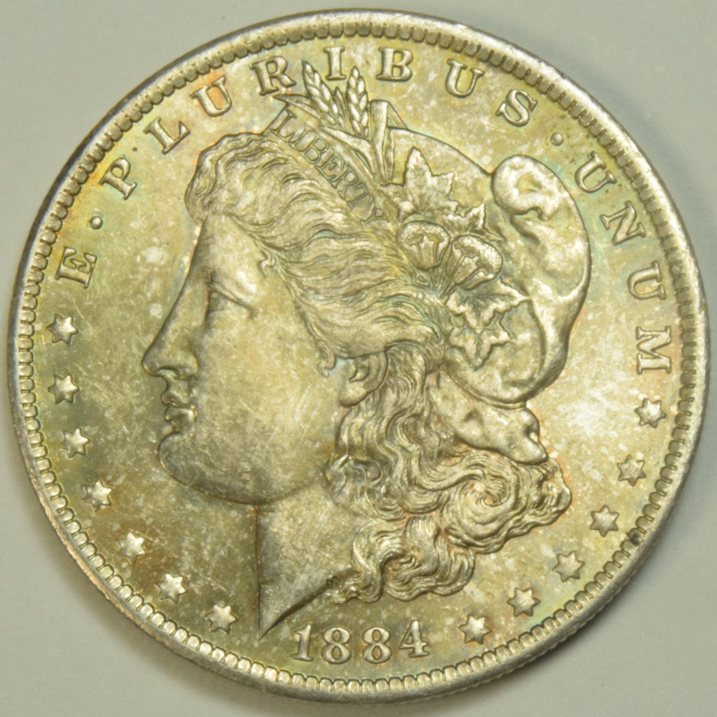 1884-O Morgan Dollar Choice BU Toned – Mount Vernon Coin
